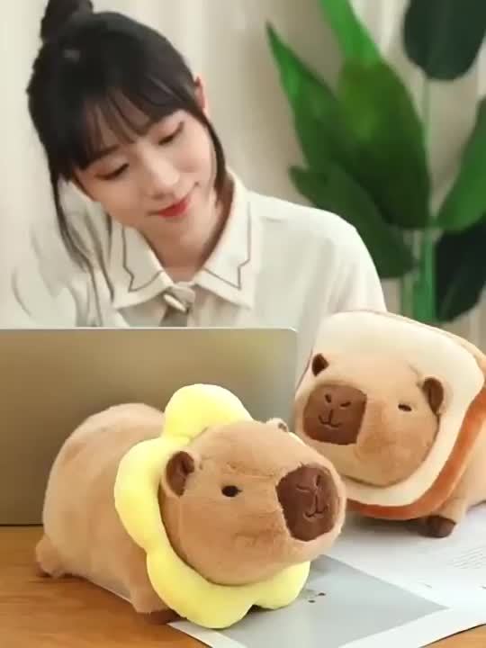Lying down Capybara Bee Toast turns into stuffed plush toy， Toast ...