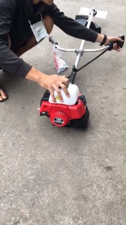 TKD เครื่องตัดหญ้า รุ่น NB411 เครื่องตัดหญ้า สะพายบ่า 2 จังหวะ คออ่อน เครื่องตัดหญ้า2T | Lazada ...