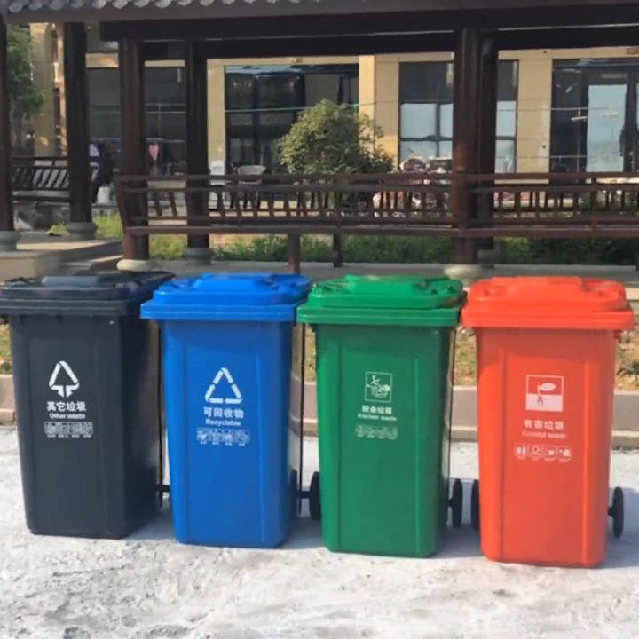 Outdoor trash can Green plastic large trash can with lid and wheels ...