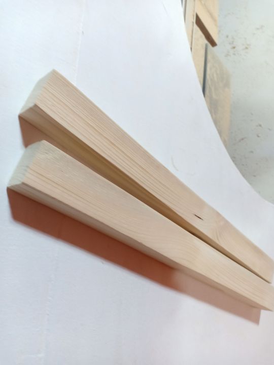 Solid wood/pinewood. 100 cm length cm by 3cm by 5 cm. smooth on all ...