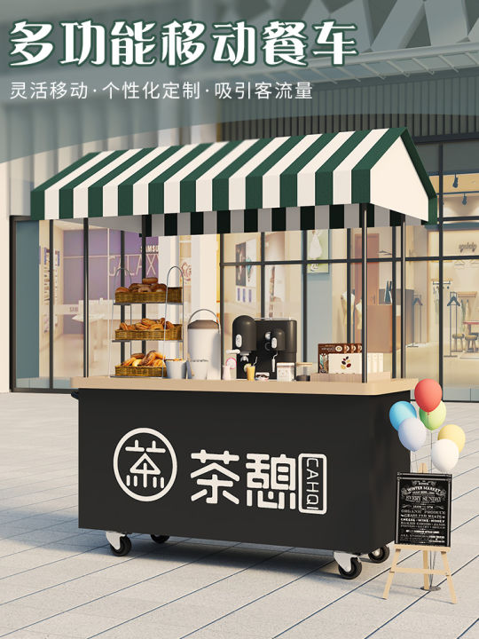 Stall carts can be moved at night markets. Snack drivers push wrought ...