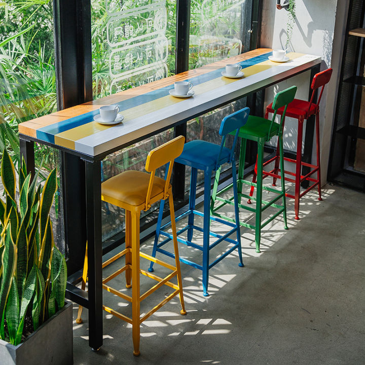 Nordic colored solid wood bar table against the wall, home tables and ...