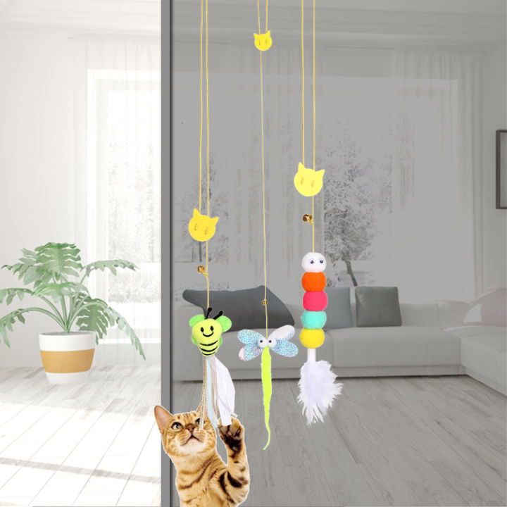 Hanging cat toy with elastic cord, can be hung on glass or door frame ...