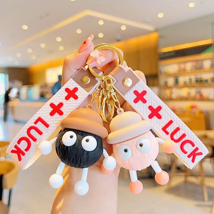 FRTH Bánh quy Đen Móc Khóa Búp bê yêu tinh briquettes Nhựa Spirited ...