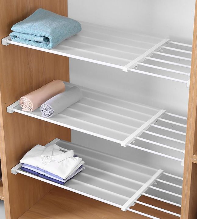 Wardrobe with retractable storage and layered partitions kitchen ...