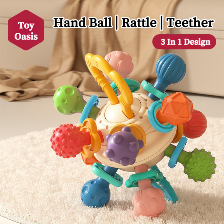 Baby teether Manhattan Baby Rattle Manhattan Ball Teething Toys Sensory ...