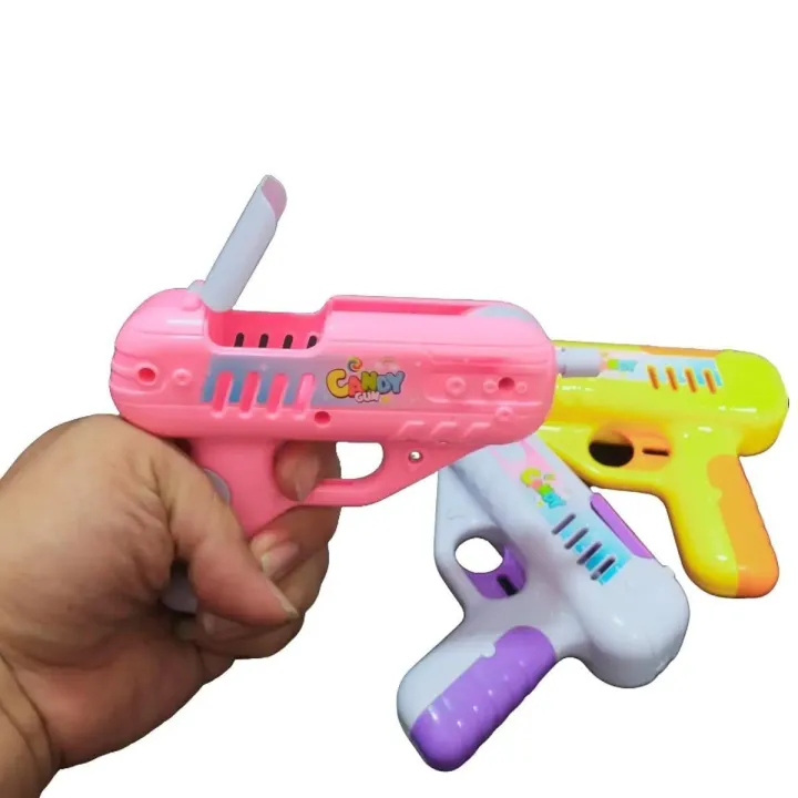 Mainan Pistol permen - Candy Gun / Lolipop Gun / POP UP CANDY GUN TOYS ...