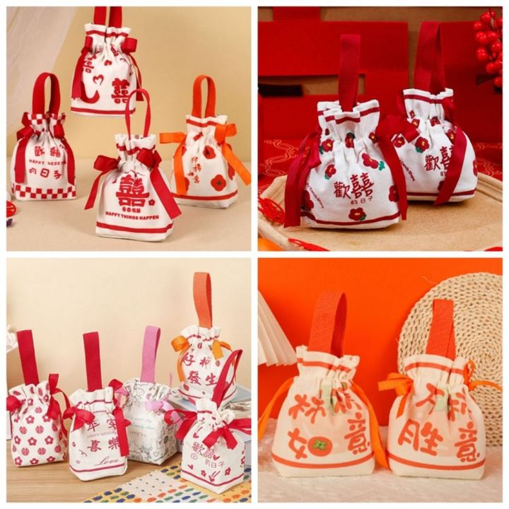 WENQI ตัวอักษรสำหรับเด็ก กระเป๋าผ้าใบหูรูดรูปดอกไม้ โบว์ริบบิ้น ลาย ...