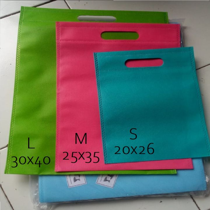 1 Pak isi 20 pcs Tas Kain Spunbond Goodie Bag Oval Kodian Ukuran Besar ...