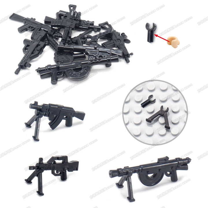 Assembling military assault guns, soldiers' building blocks, military ...