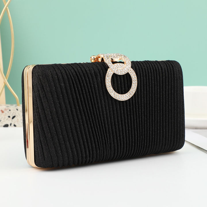 GFS Stylish and luxurious, diamond-set dinner bag with pleated designs ...