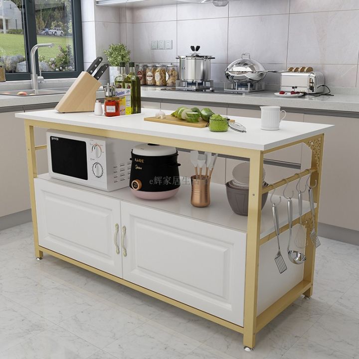 Kitchen chopping table console microwave oven oven shelf floor cupboard ...