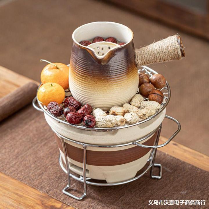 Boiling tea in a stove, roasting milk tea pot, white clay pot, tea pot ...