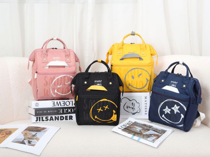 พร้อมส่ง anello x SMILEY กระเป๋าเป้แฟชั่นผู้หญิง ผู้ชาย ช่องเยอะใส่ของ ...