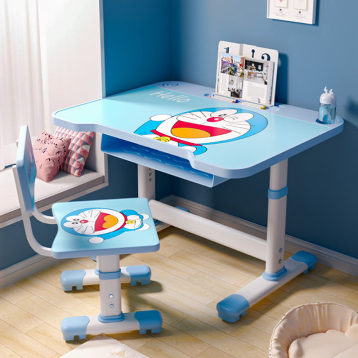 Children's writing desk can be lifted. Pupils write homework. Baby ...