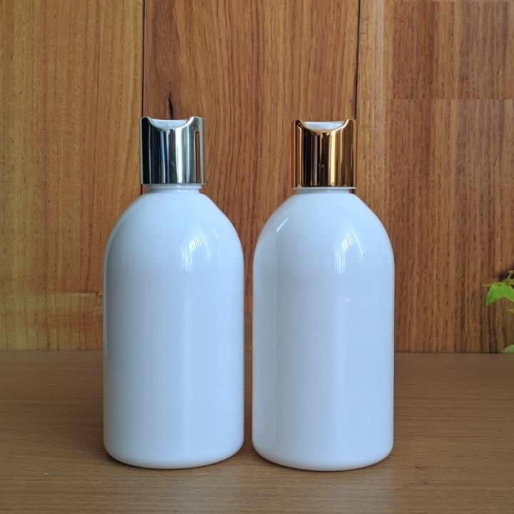 BOTOL 250ML OVAL WHITE PRESSTOP GOLD BOTOL IS ULANG / BOTOL PRESSTOP ...
