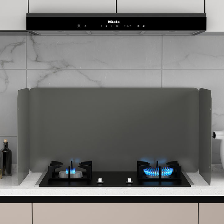 Stainless steel kitchen gas stove is used for cooking oil overflow ...