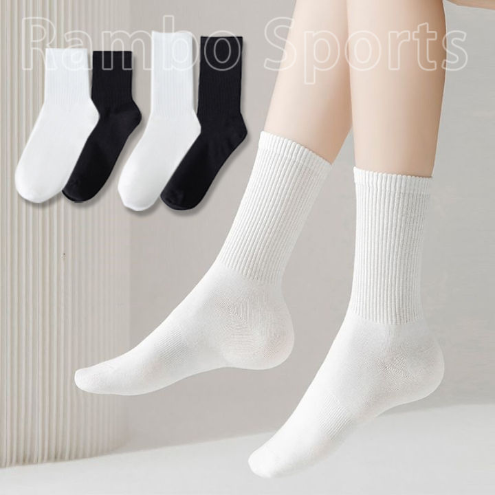 Black socks for children with small leather shoes and long barrel solid ...
