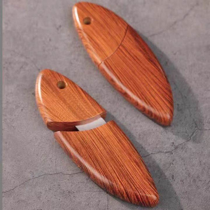 Handmade woodworking tools, each tool head made of a piece of wood ...