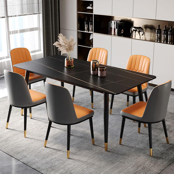The modern simple and luxurious dining table on the rock plate is a ...