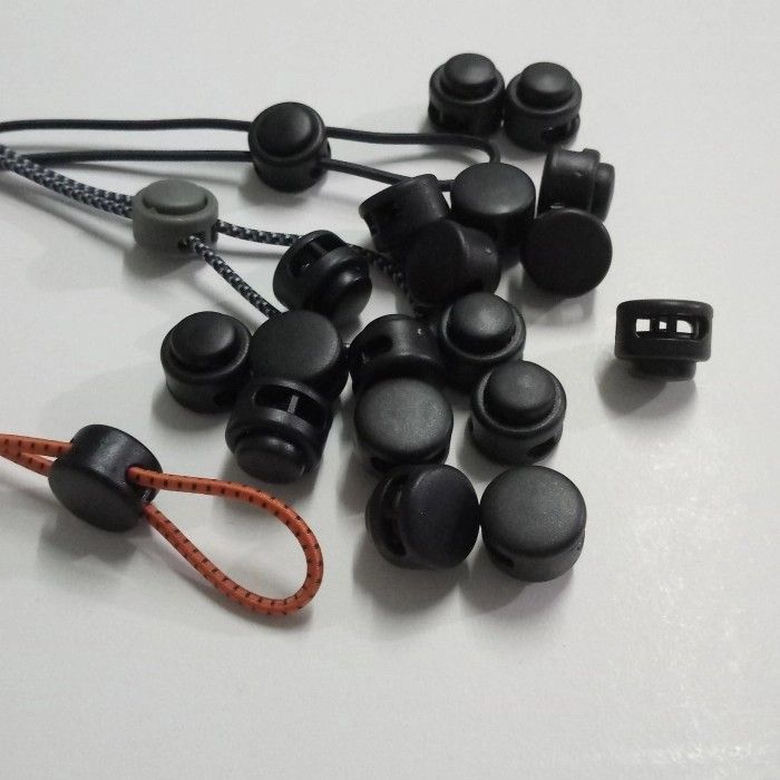 Stoper klakson tali Jaket 2 lubang / Stopper tali plastik bulat /stoper ...