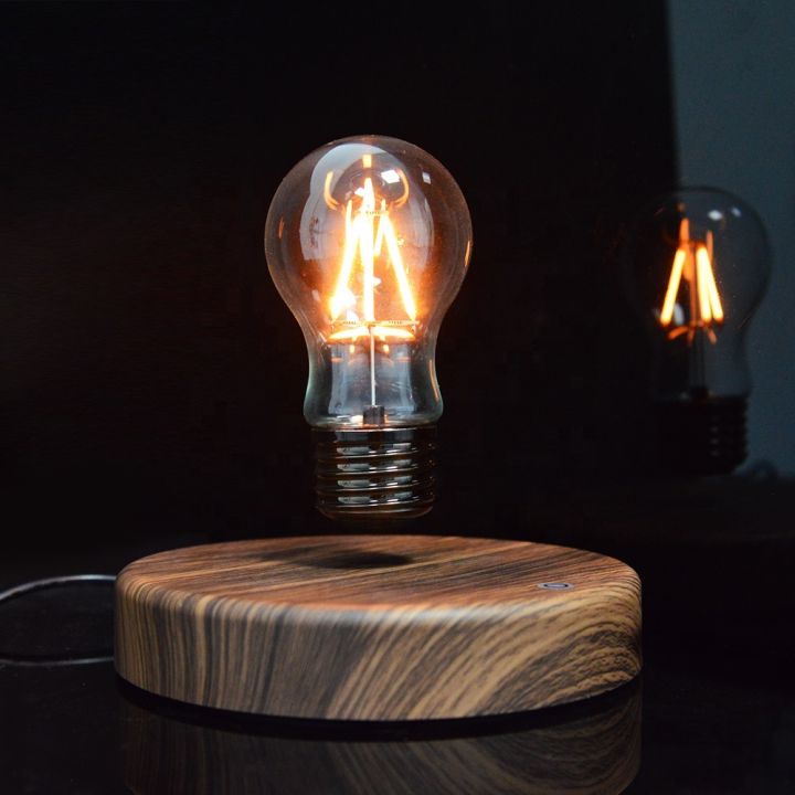 Bottom base magnetic rotating and tating floating lighting bulb for ...