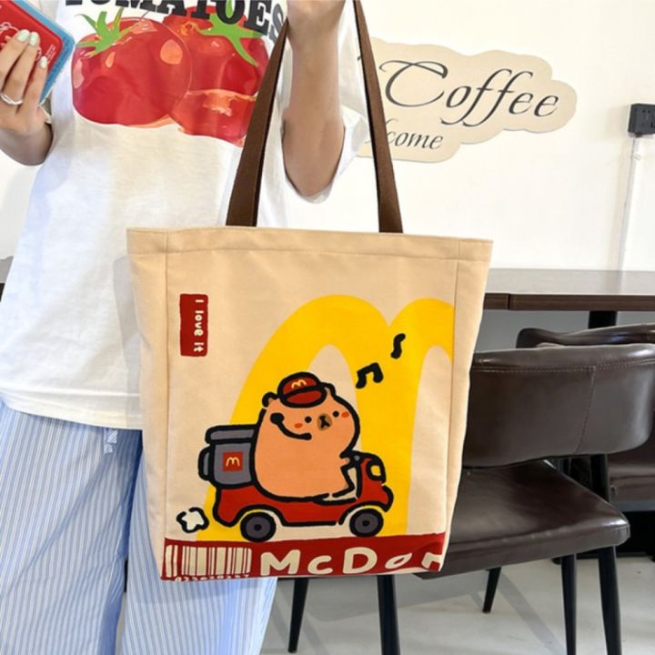 GHFT สไตล์วิทยาลัย กระเป๋าผ้าใบ Capybara กระเป๋าโท้ท จุได้มาก กระเป๋า ...