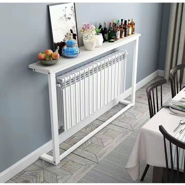 The gap between the bed and the shelf behind the sofa is multi-layered ...